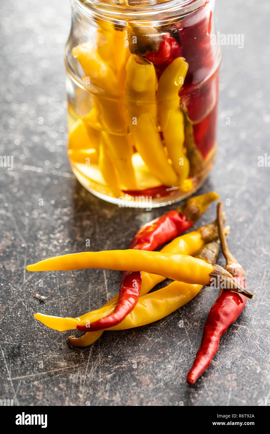 Pickled hot chili peppers Stock Photo - Alamy