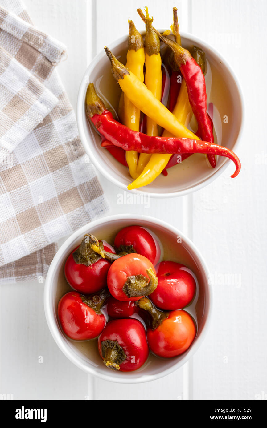 Pickled hot chili peppers Stock Photo - Alamy