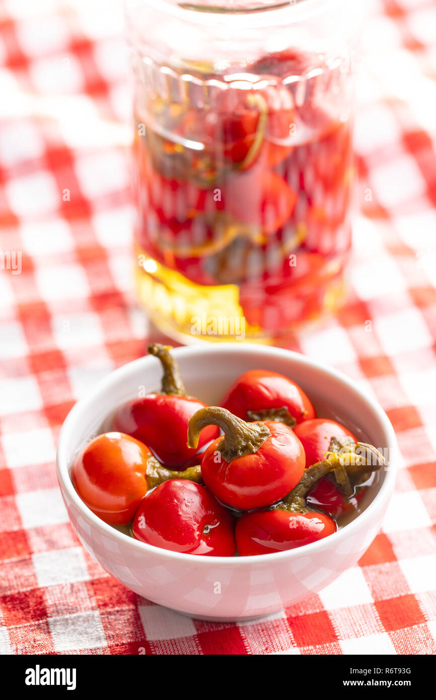Pickled hot chili peppers Stock Photo - Alamy