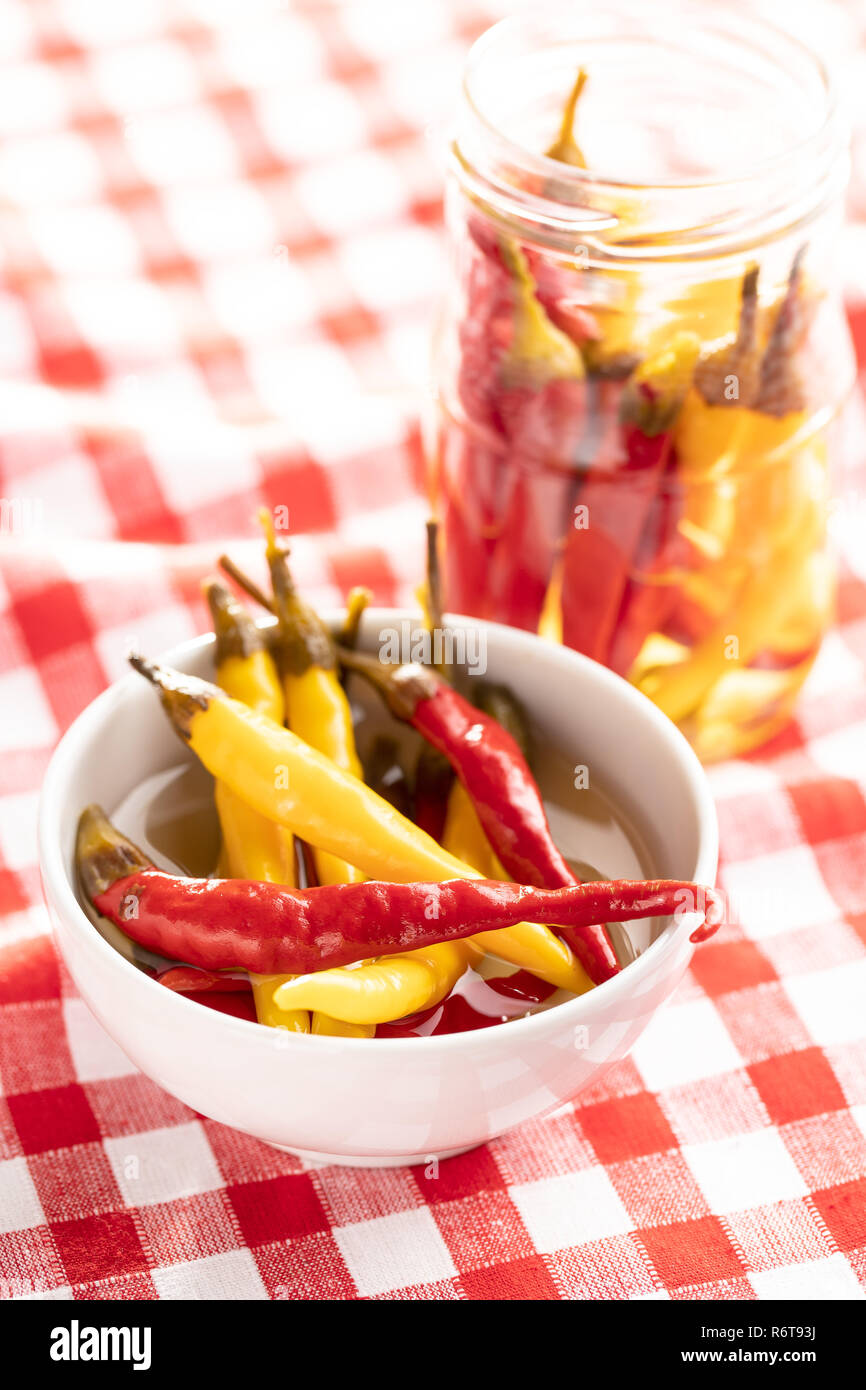 Pickled hot chili peppers Stock Photo - Alamy
