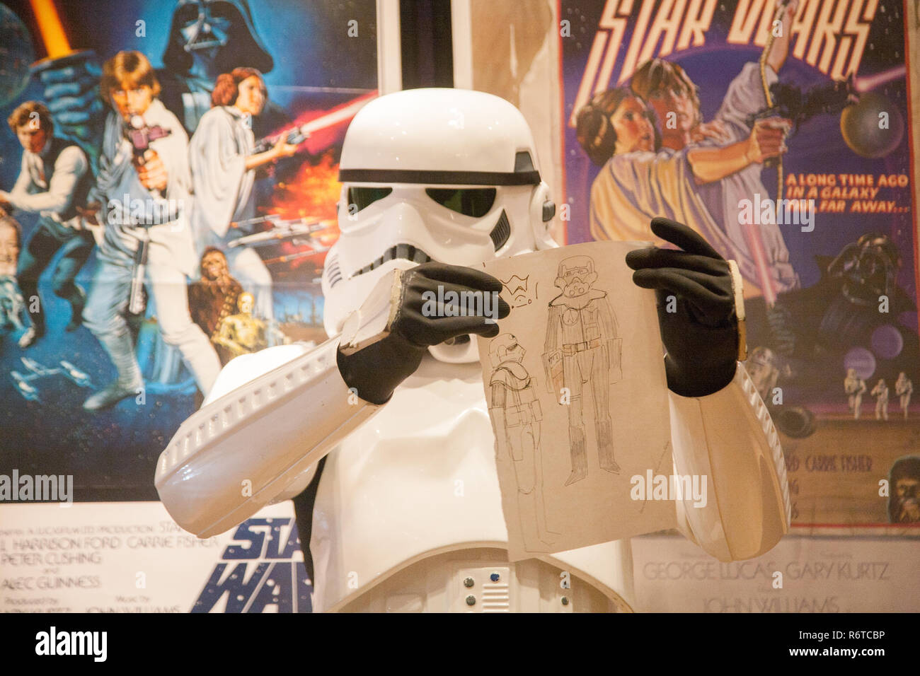 London UK. 6th December 2018. A Stormtrooper holds the original Star ...