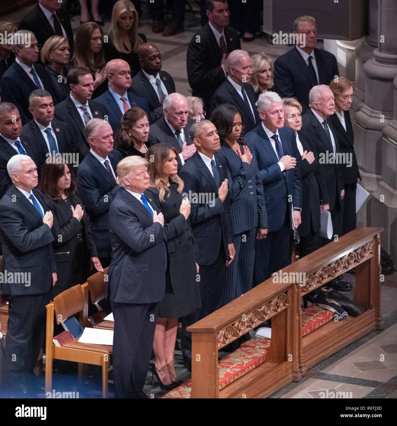 Dignitaries pay their respects as the casket containing the remains of ...