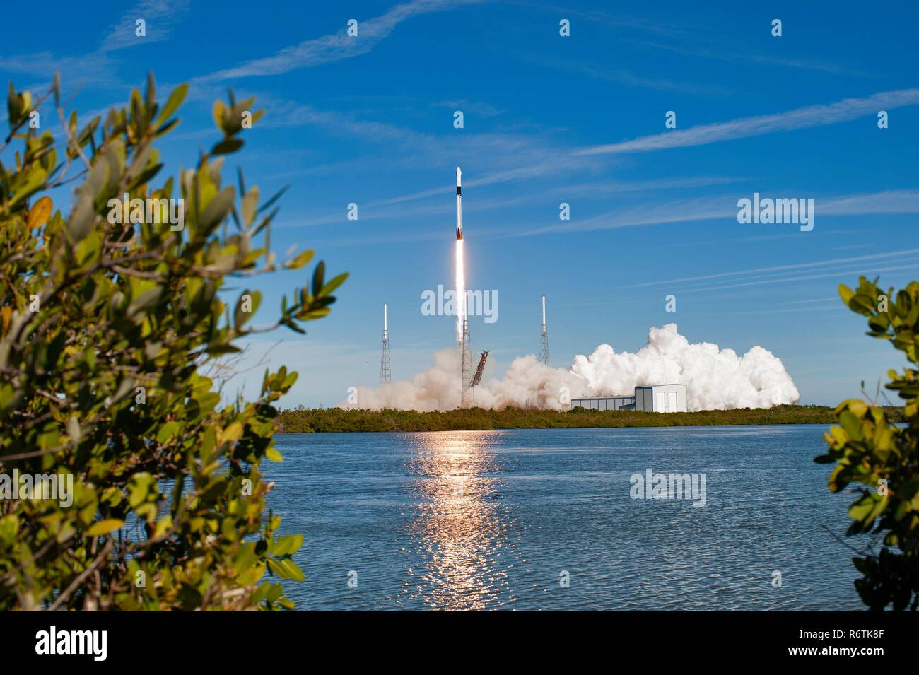 A SpaceX Falcon 9 rocket carrying the Dragon resupply spacecraft blasts ...