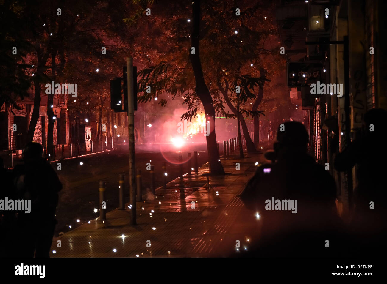 Athens, Greece. 6th Dec, 2018. A petrol bomb seen exploding during the ...