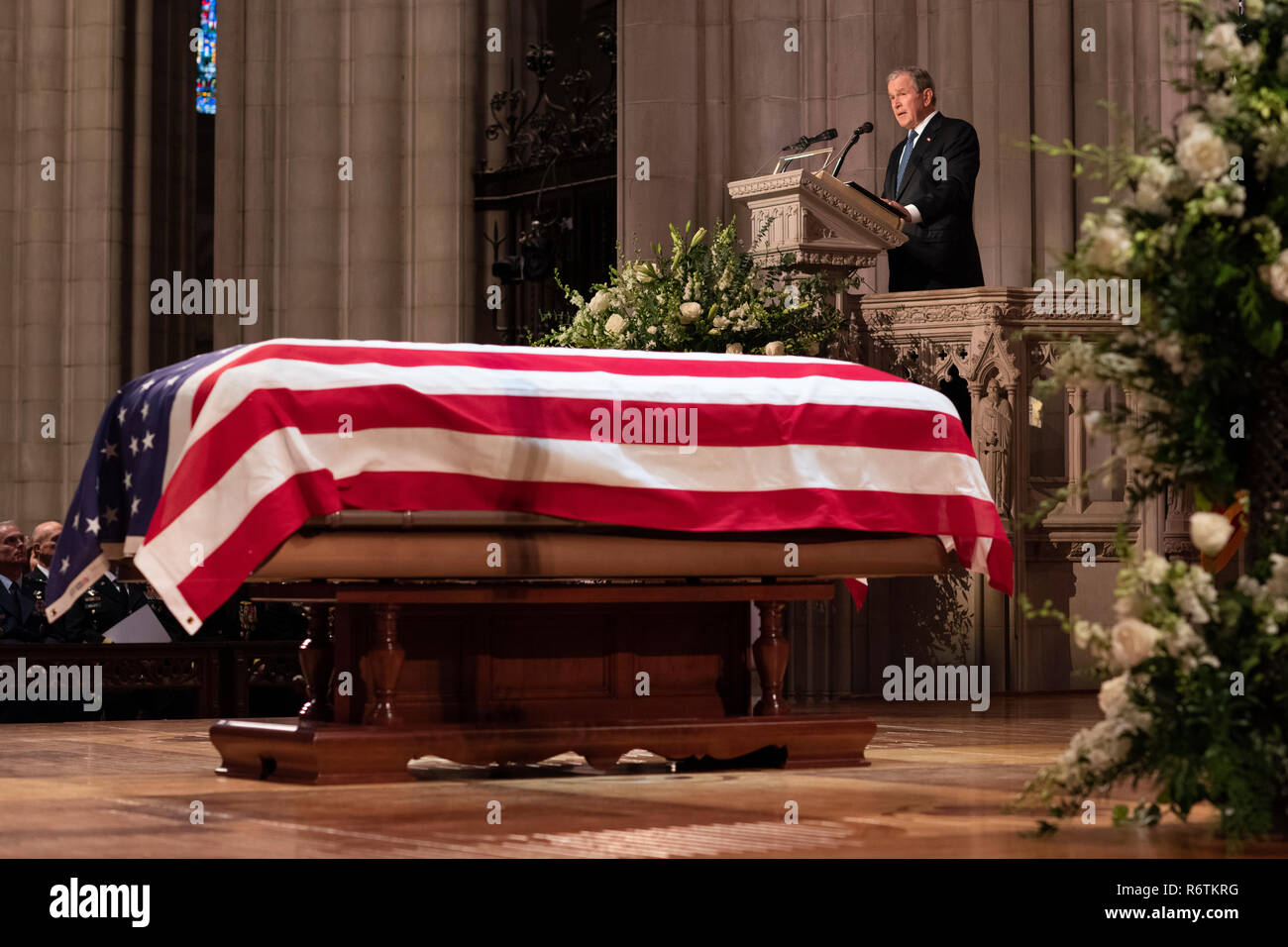 Former President George W. Bush, delivers a eulogy as casket of his ...