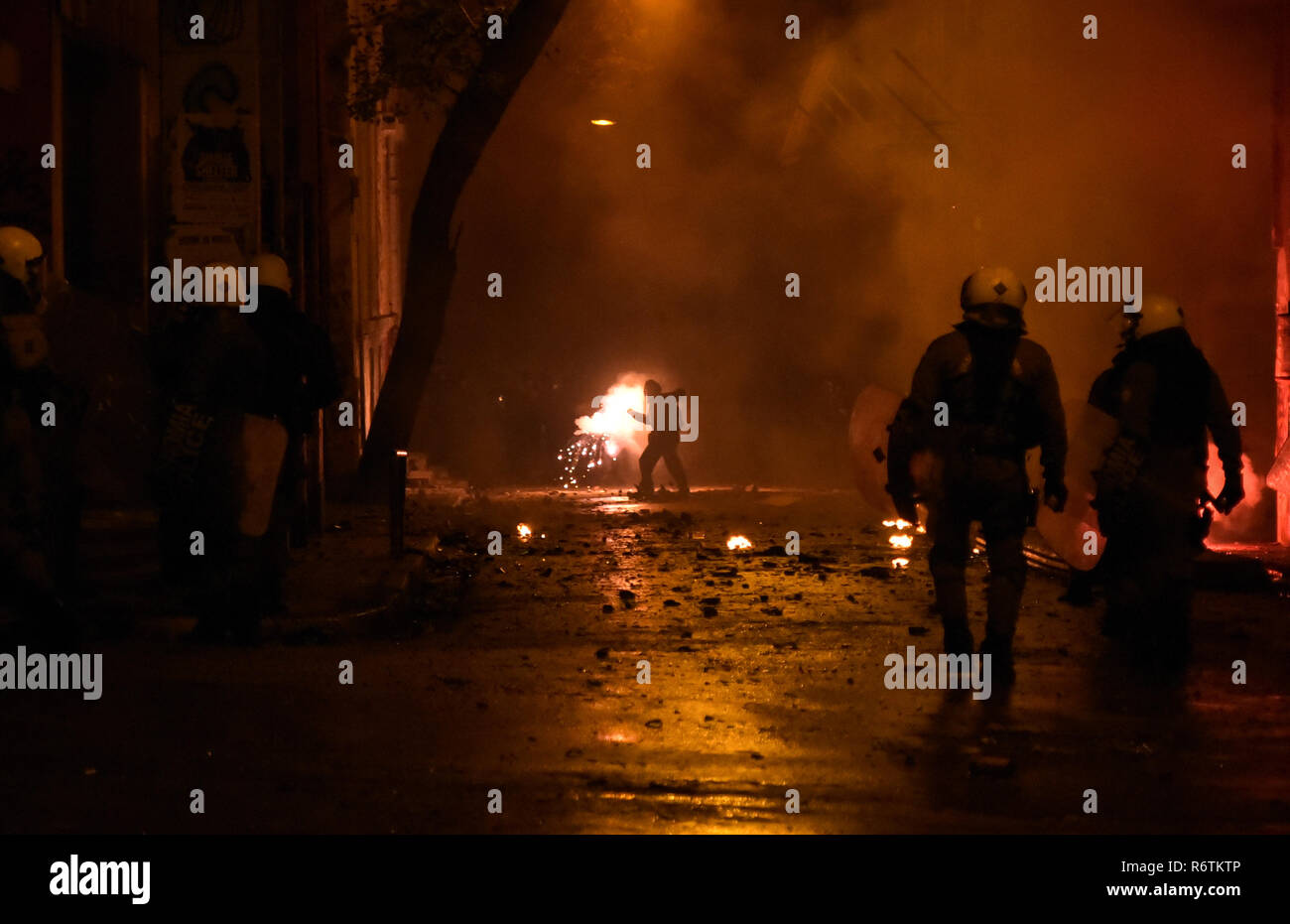 A fire is seen after protesters throw petrol bomb toward the riot ...