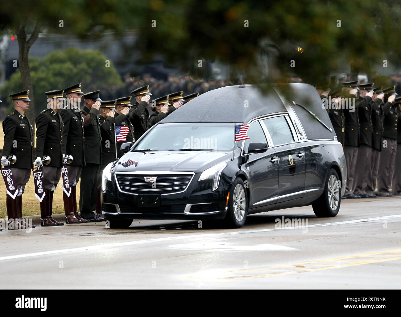 Houston, USA. 6th Dec, 2018. A vehicle carrying the body of former U.S ...