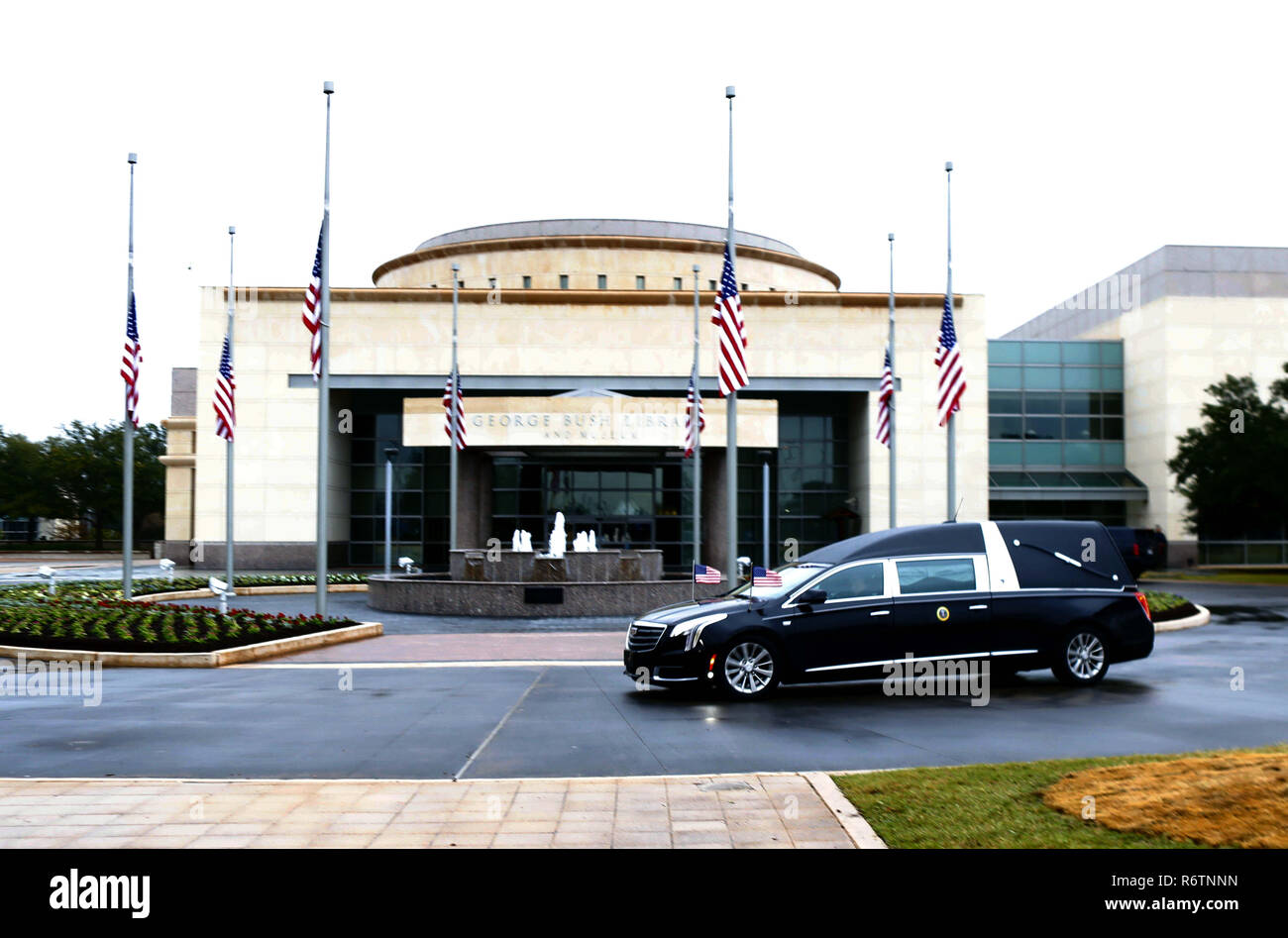 Houston, USA. 6th Dec, 2018. A vehicle carrying the body of former U.S ...