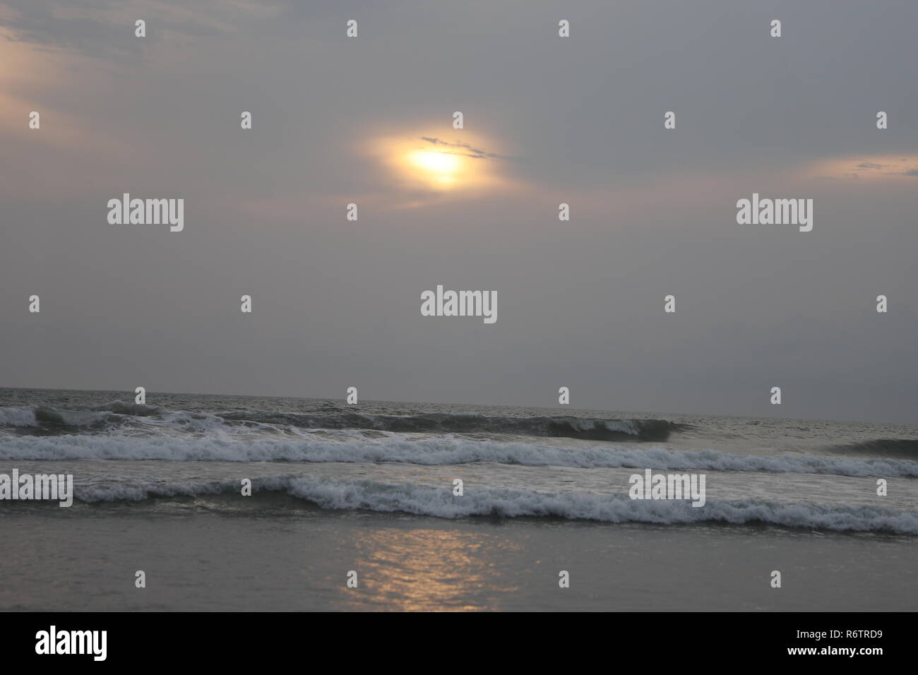 Beautiful and soothing sunrise on the beach in Goa Stock Photo - Alamy