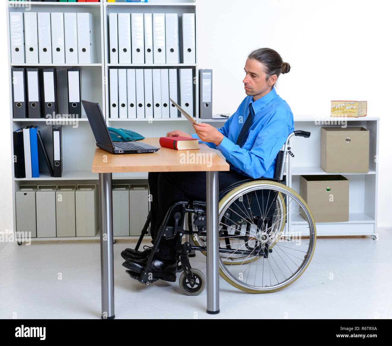 disabled business man in wheelchair Stock Photo - Alamy