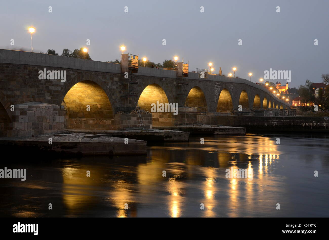 Medieval Stone Bridge in Regensburg, Germany by night Stock Photo - Alamy