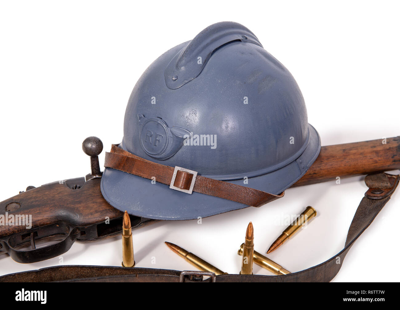 french military helmet of the First World War with rifle on white Stock ...