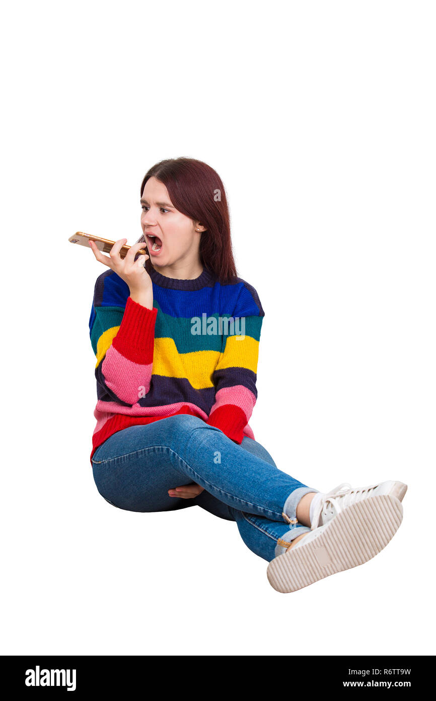 Portrait angry young woman shouting and screaming on mobile phone ...