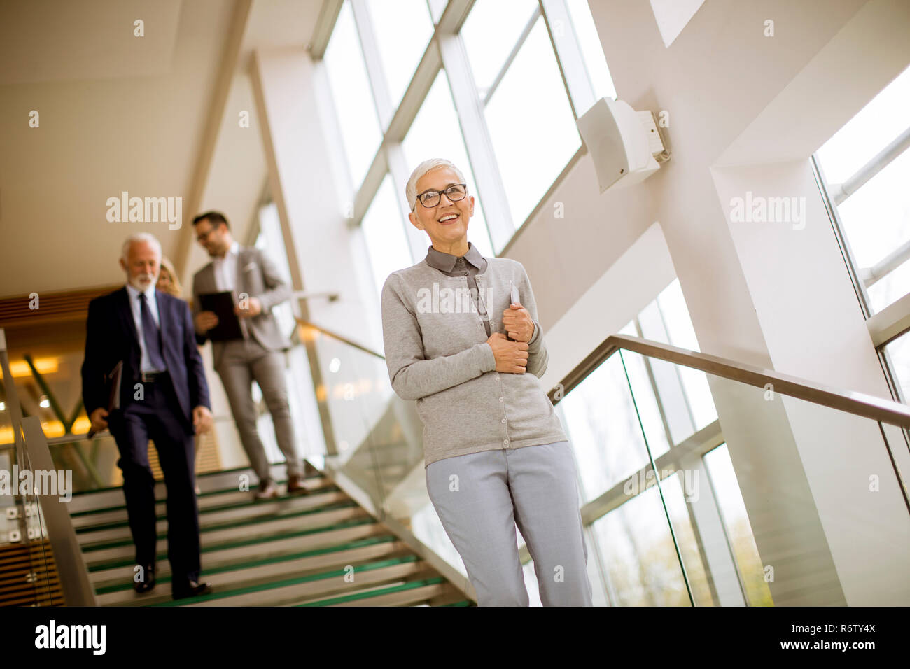Man coming down stairs hi-res stock photography and images - Alamy