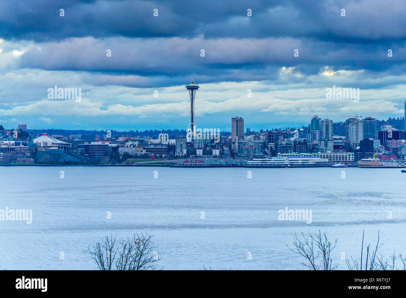 A view of the Seattle skyline with dark clouds overhead Stock Photo - Alamy