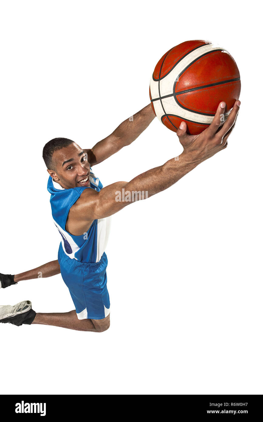 Full length portrait of a basketball player with ball Stock Photo - Alamy