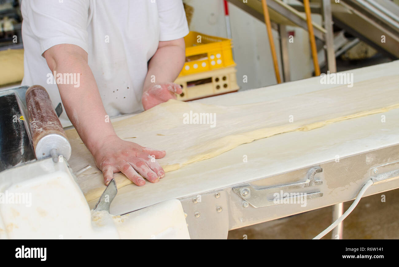 Automatic dough line hi-res stock photography and images - Alamy