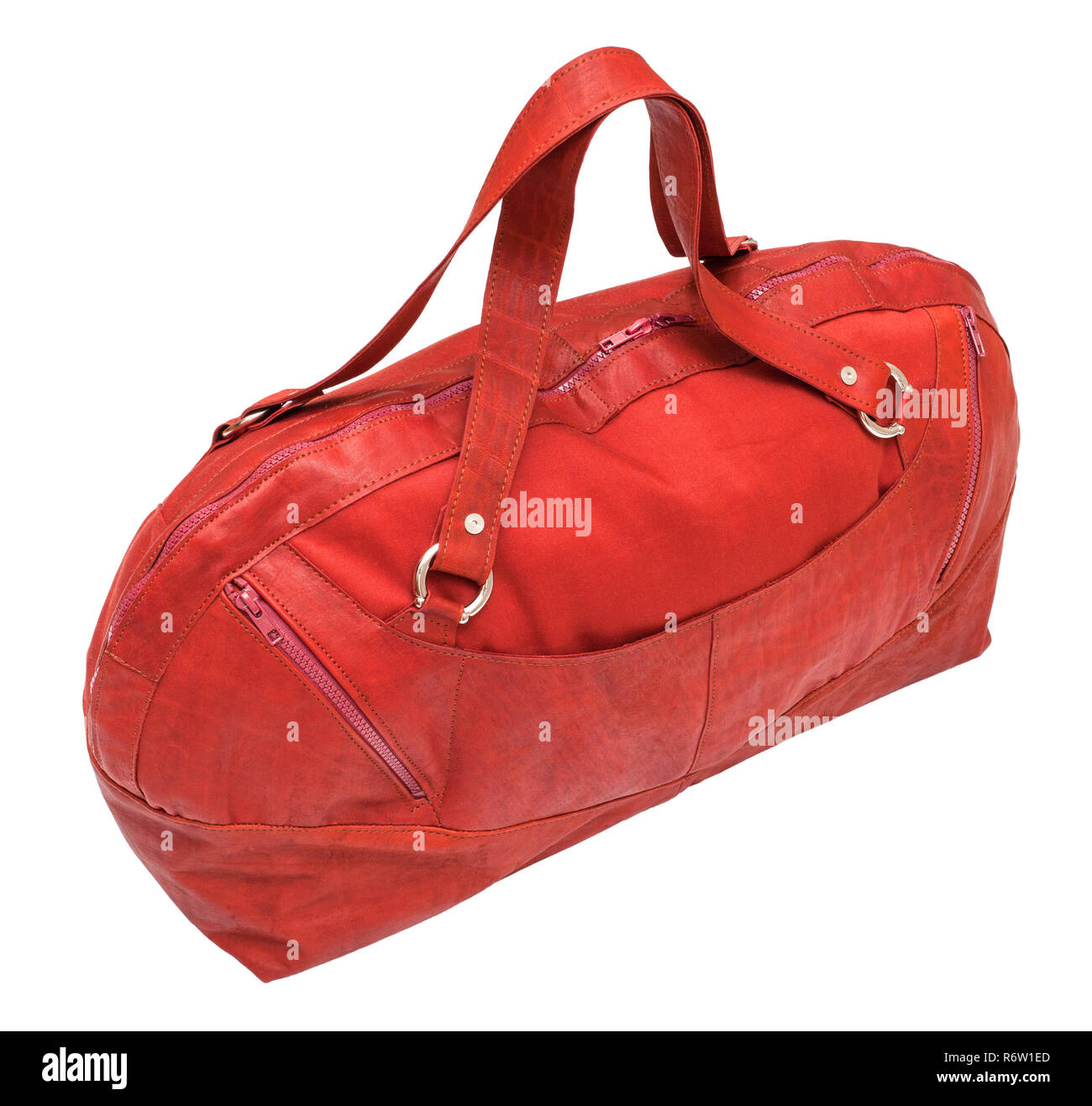 side view of closed red travel bag isolated Stock Photo - Alamy