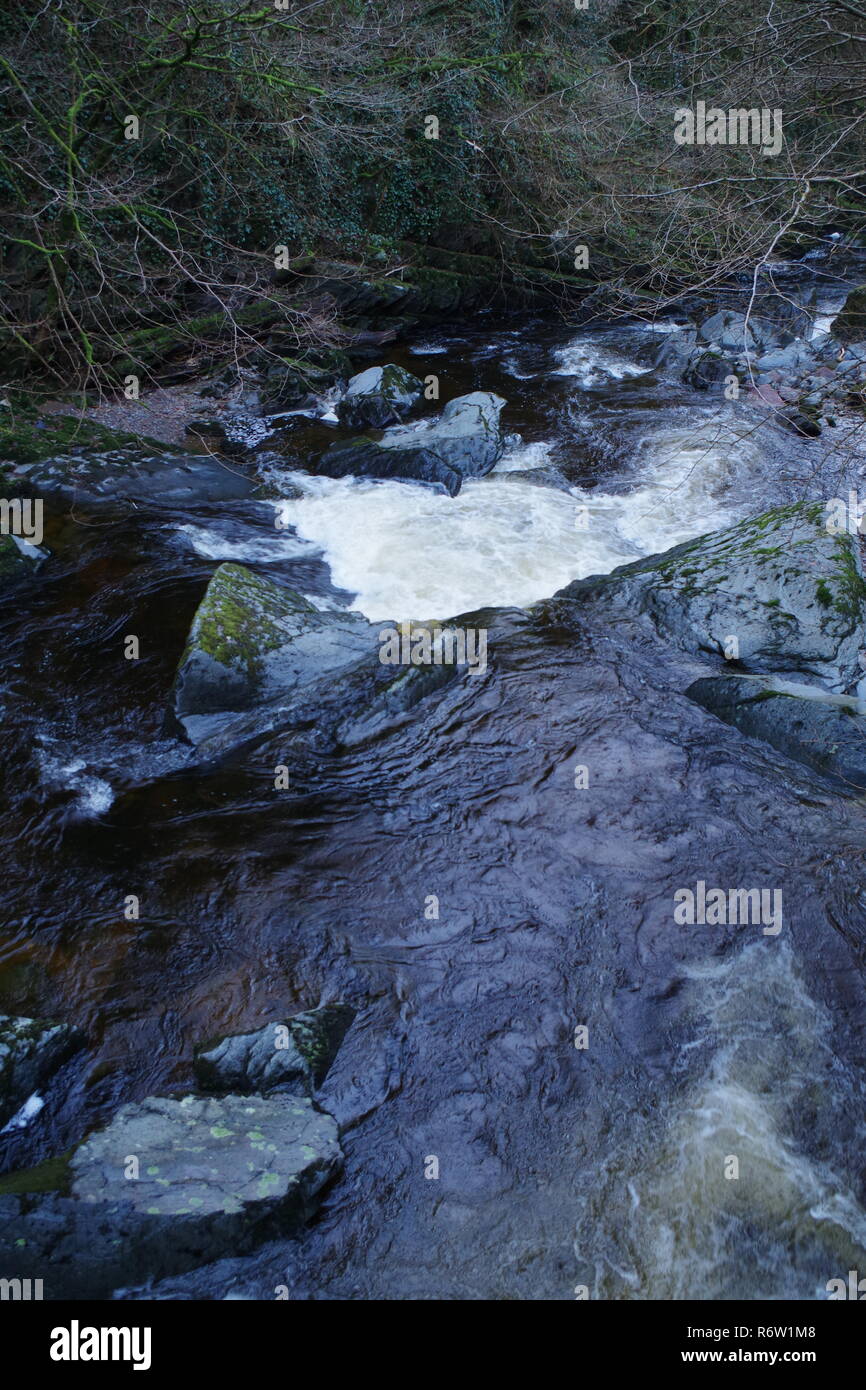 White Water Rapids over the Boulder Strewn East Lyn River. Intimate ...