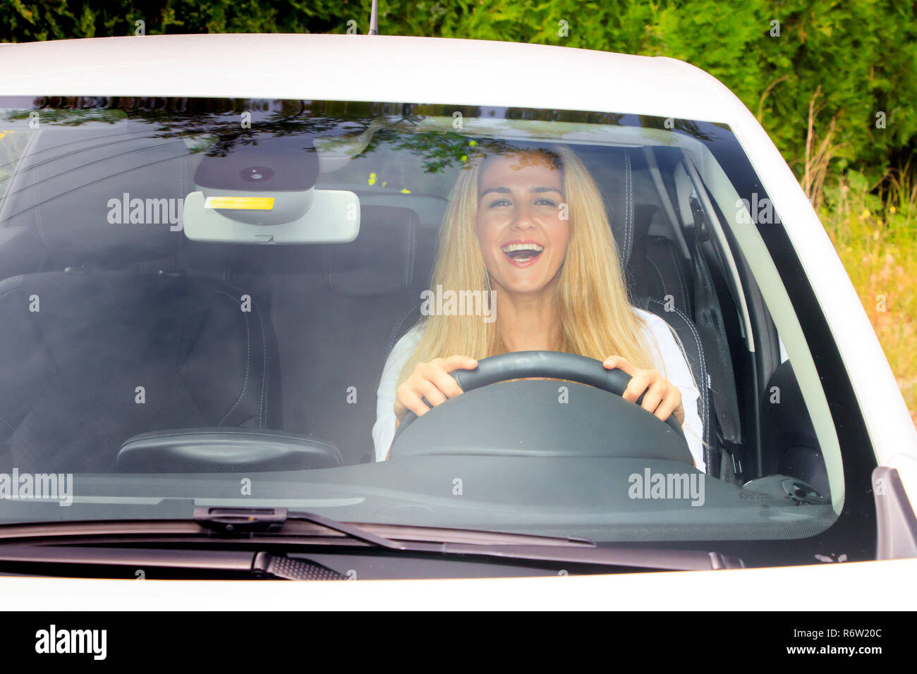 Woman is driving her car Stock Photo - Alamy