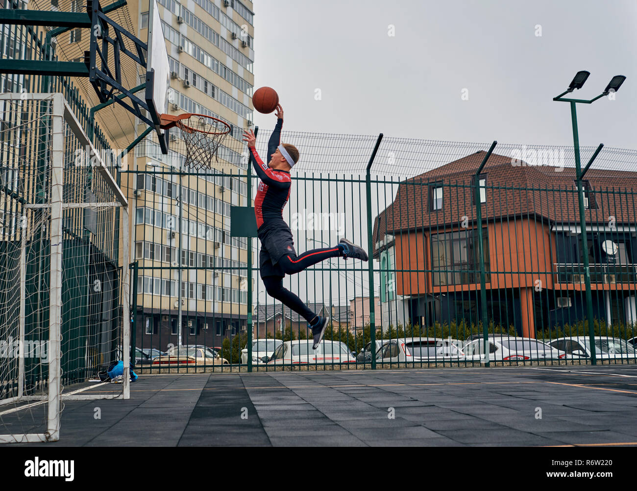basketball player playing on the street Stock Photo - Alamy
