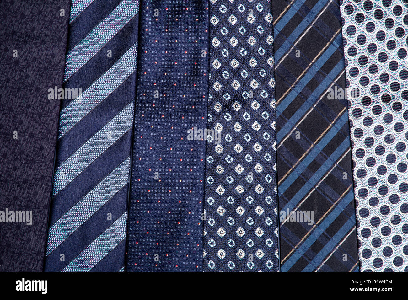creative tie with blue background Stock Photo - Alamy