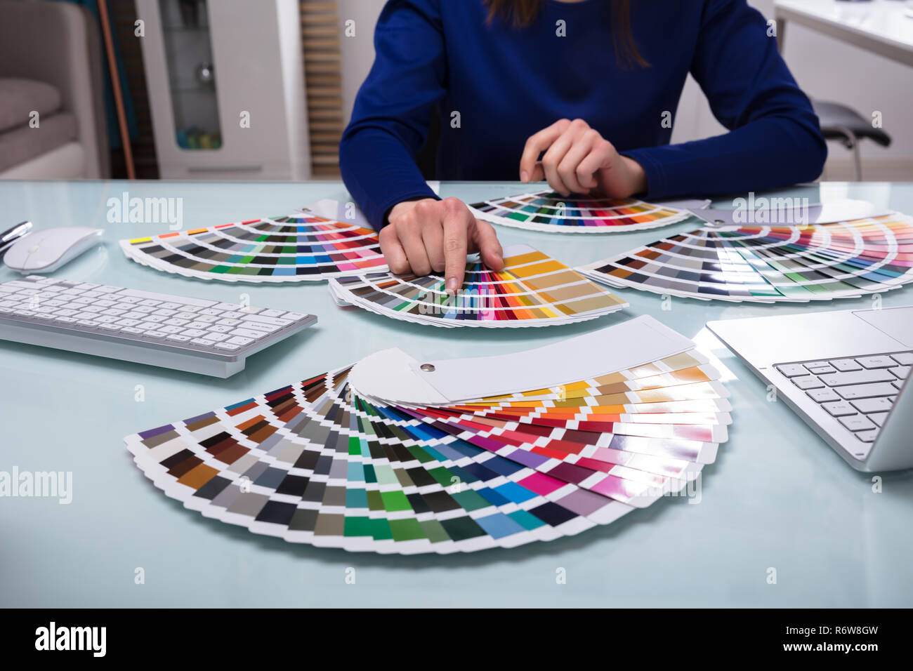 Designer Choosing Color From Color Swatches Stock Photo - Alamy
