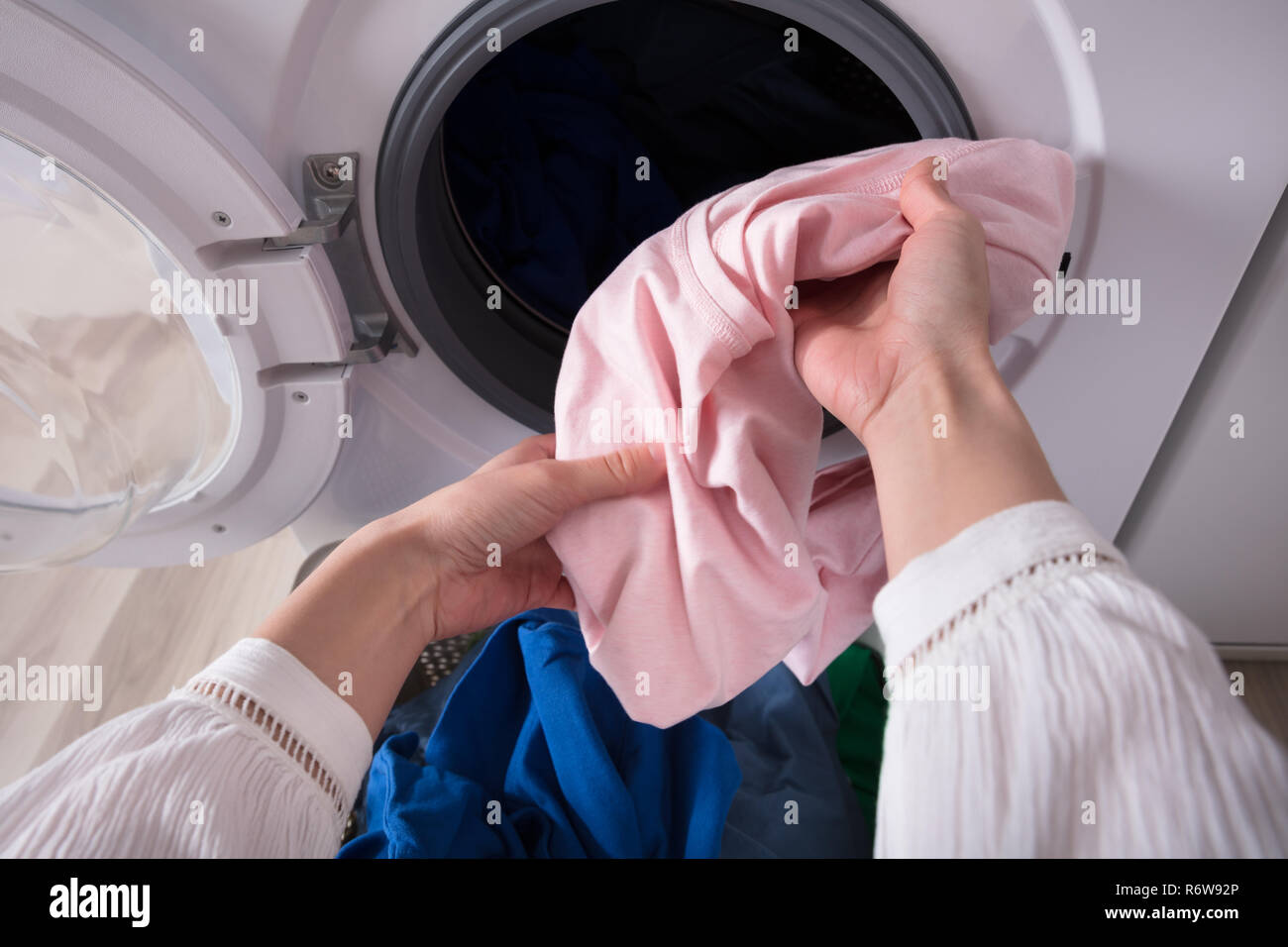 Womans washing clothes hi-res stock photography and images - Alamy