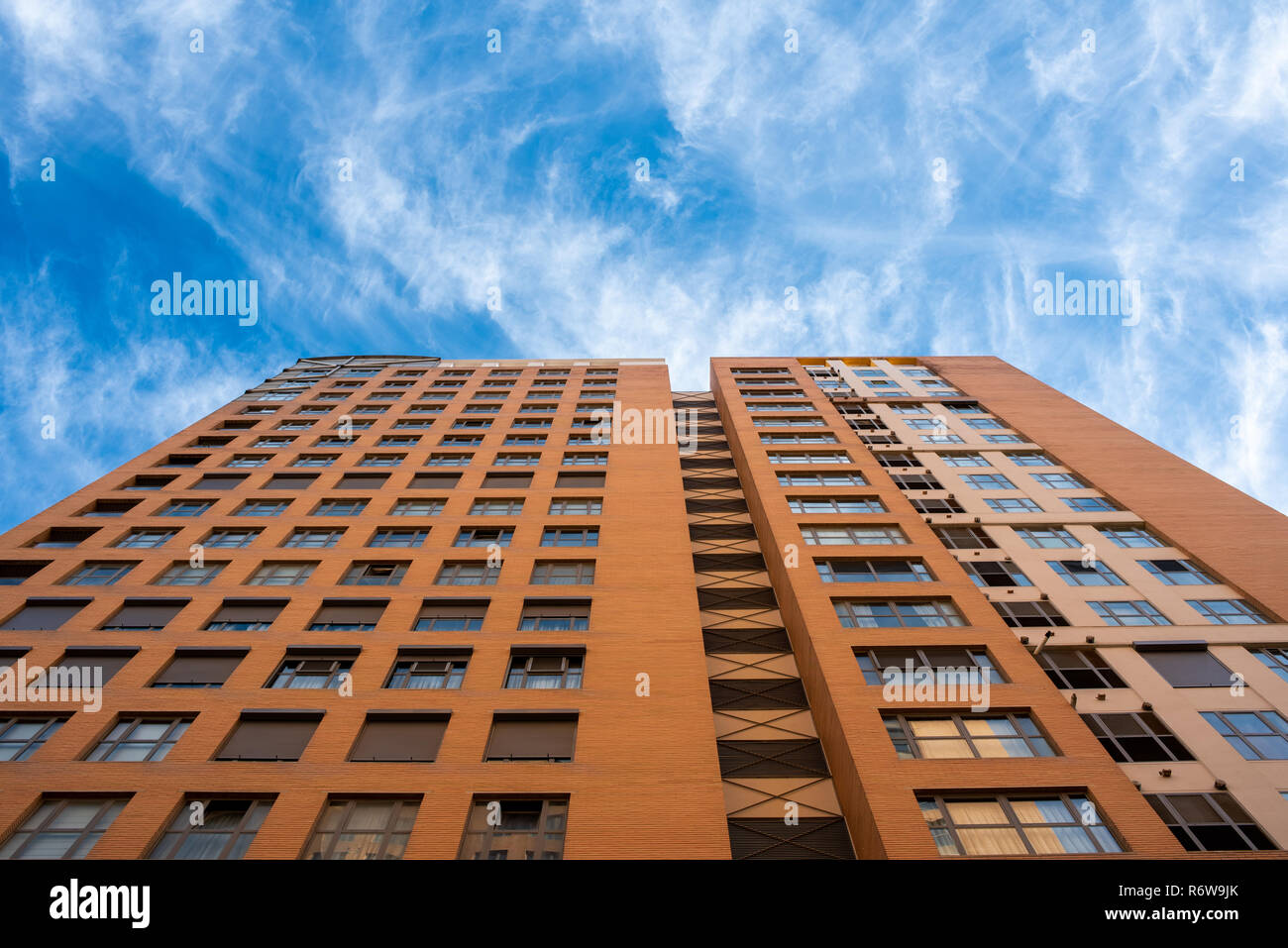 Vertical buildings of houses with blue sky background photographed from ...
