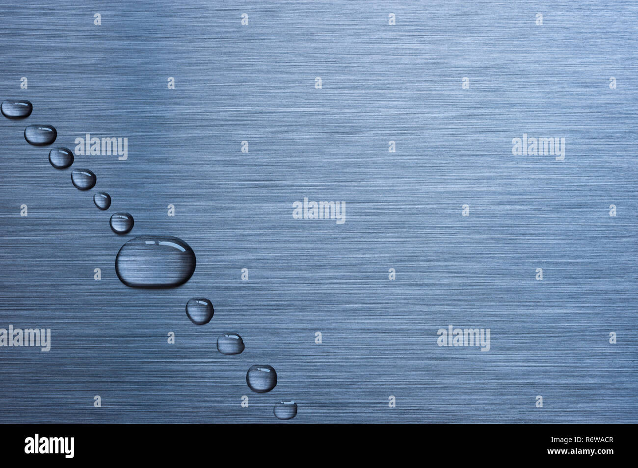 Water drops on brushed metal background Stock Photo - Alamy