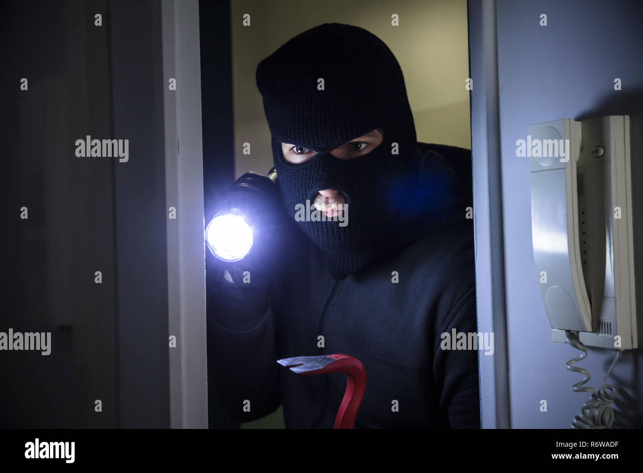 Thief Entering Into House Stock Photo - Alamy