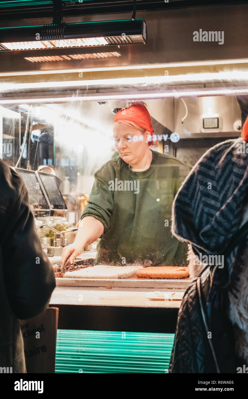 Vienna, Austria - November 25, 2018: Female staff working at the Zum ...