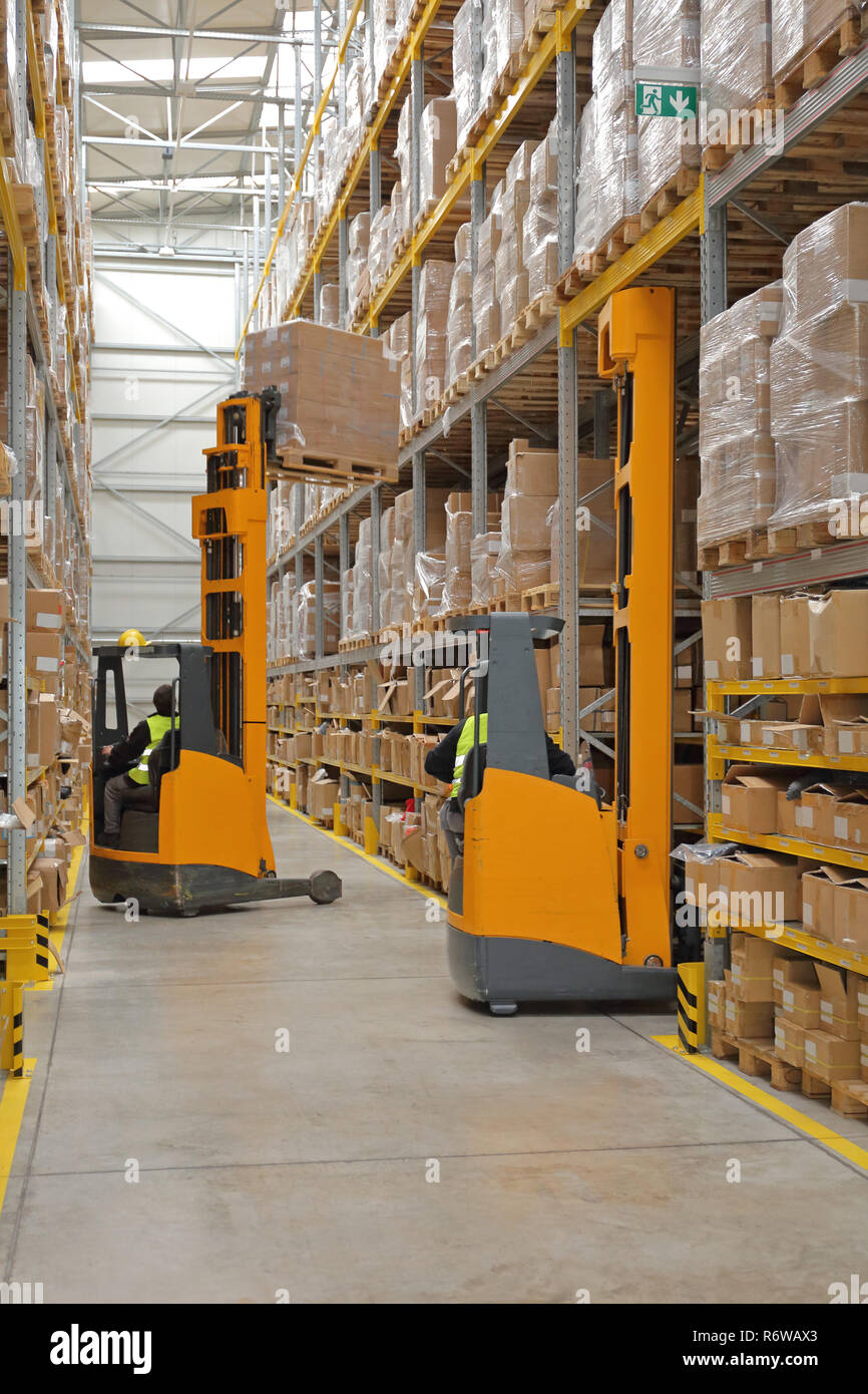 Two Forklifts Warehouse Stock Photo - Alamy