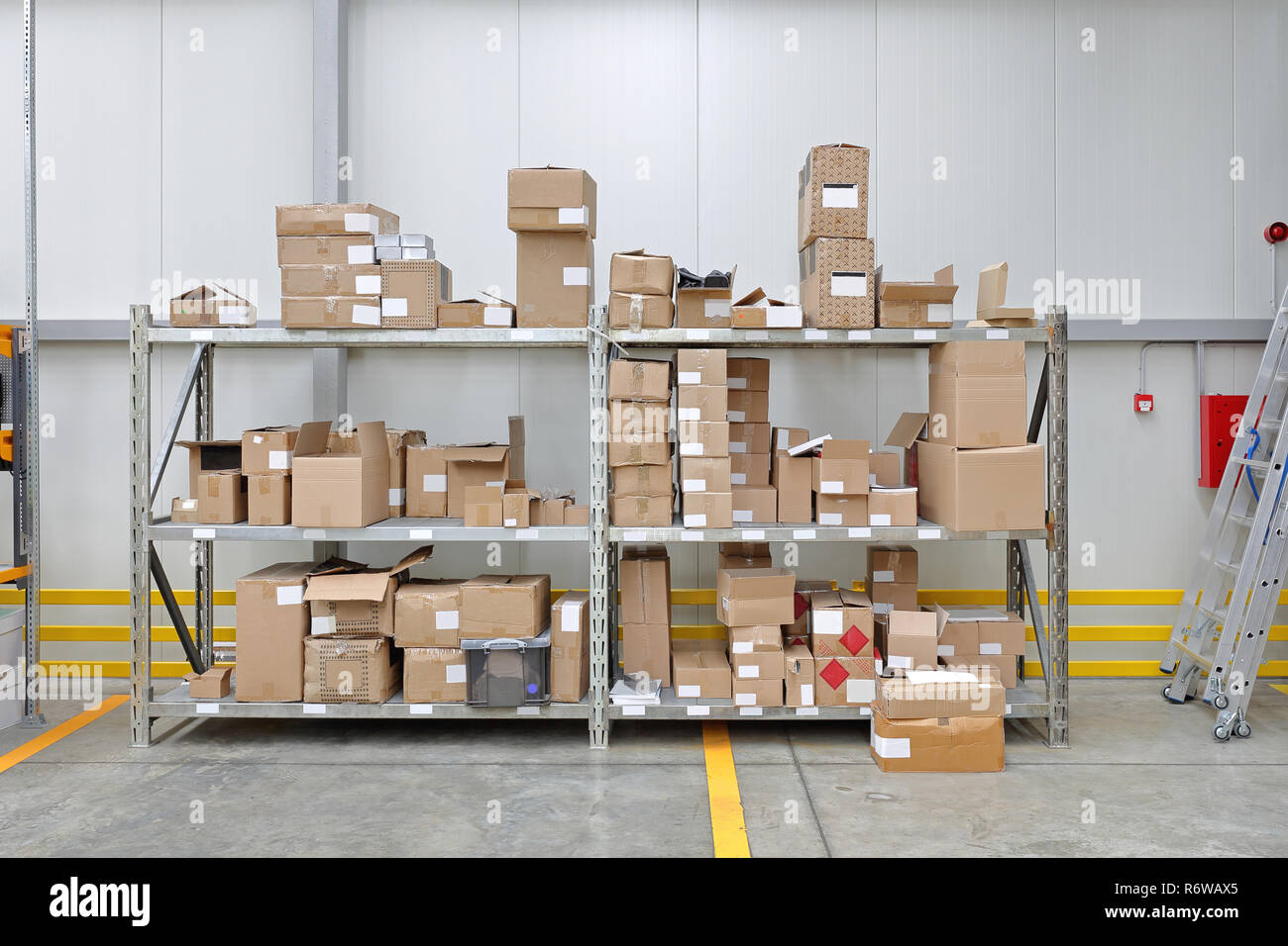 Shelf With Boxes Stock Photo - Alamy