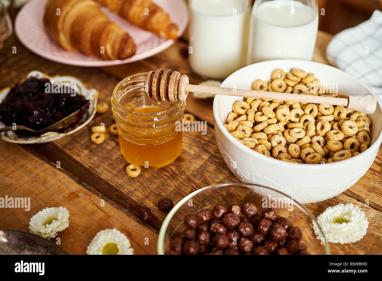 Healthy morning breakfast with different types of breakfast cereal with ...