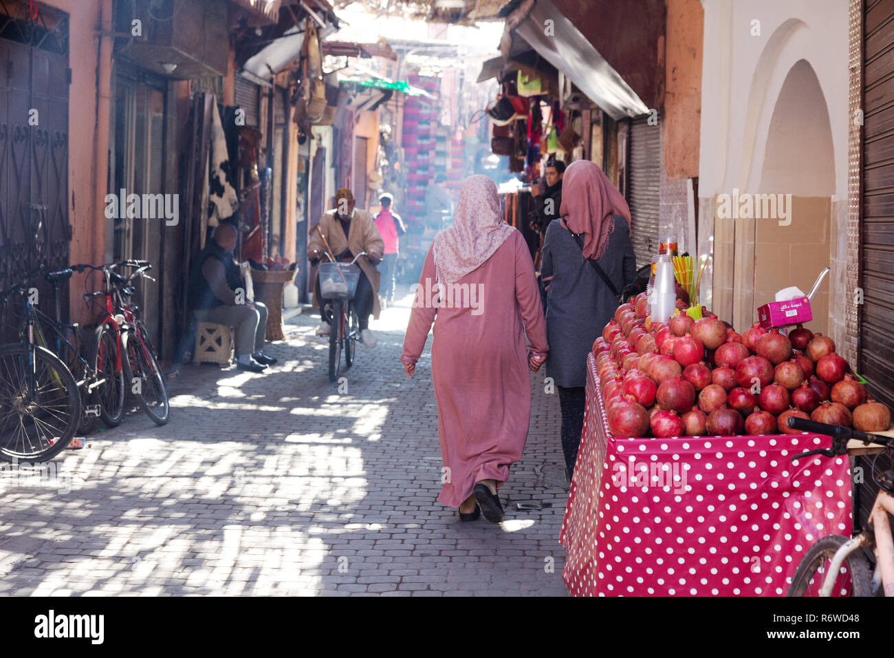 Marrakech Medina - street scene with food for sale and local people ...