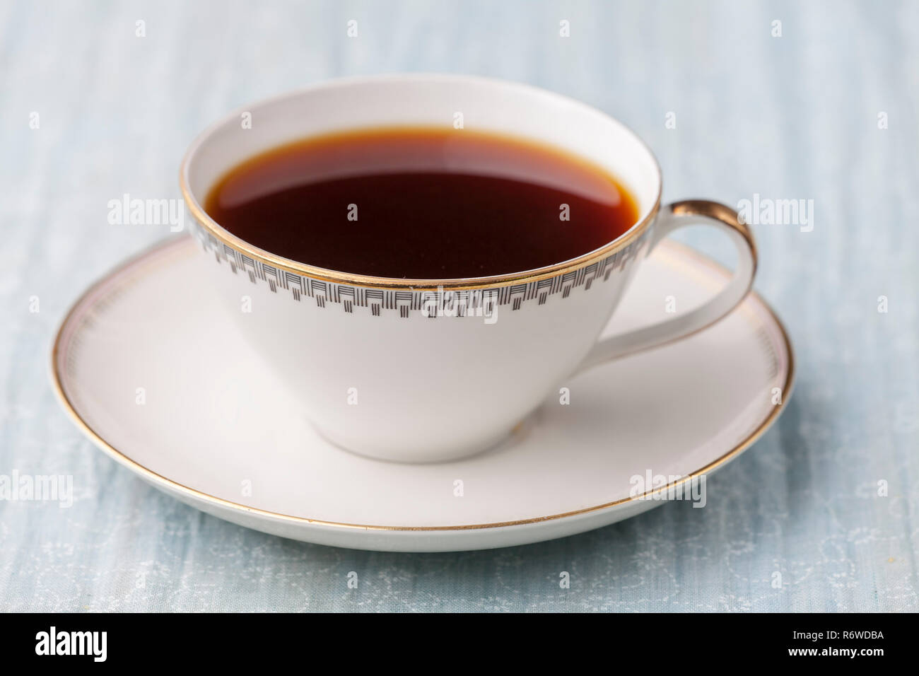 cup of coffee in an old cup Stock Photo - Alamy
