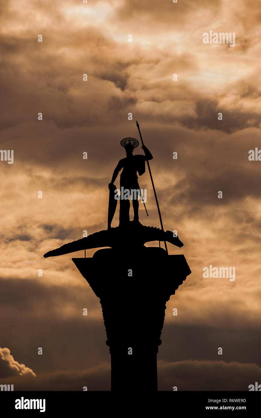 Saint Theodore medieval statue with bronze lance and shield trampling ...