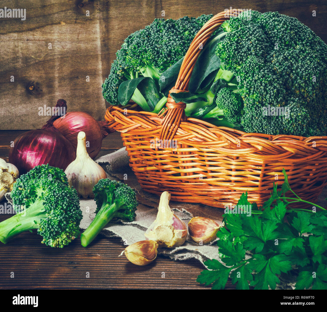 fresh broccoli in a wicker brown basket Stock Photo - Alamy