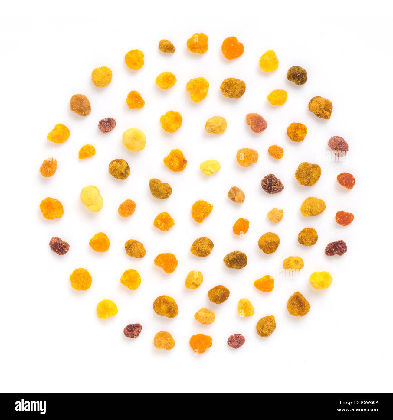 close up bee pollen round isolated white Stock Photo - Alamy