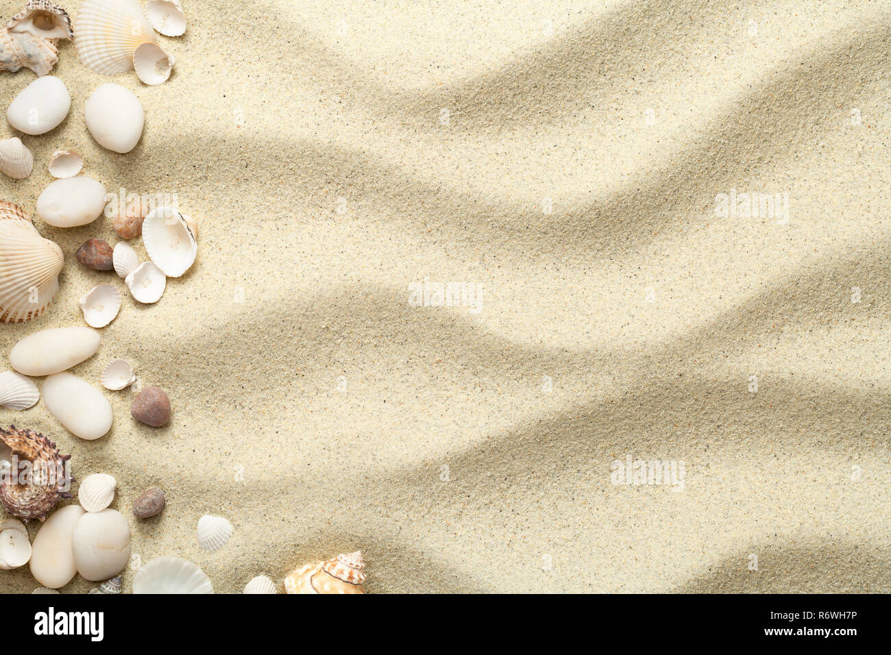 sand,beach background with shells and stones Stock Photo - Alamy
