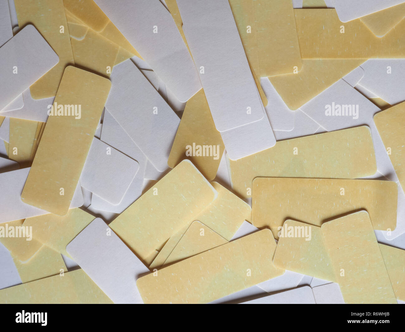 white and yellow labels Stock Photo - Alamy