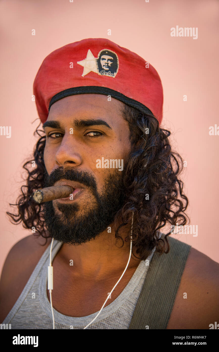 Young man smoking a Cuban cigar in Trinidad, Cuba Stock Photo - Alamy