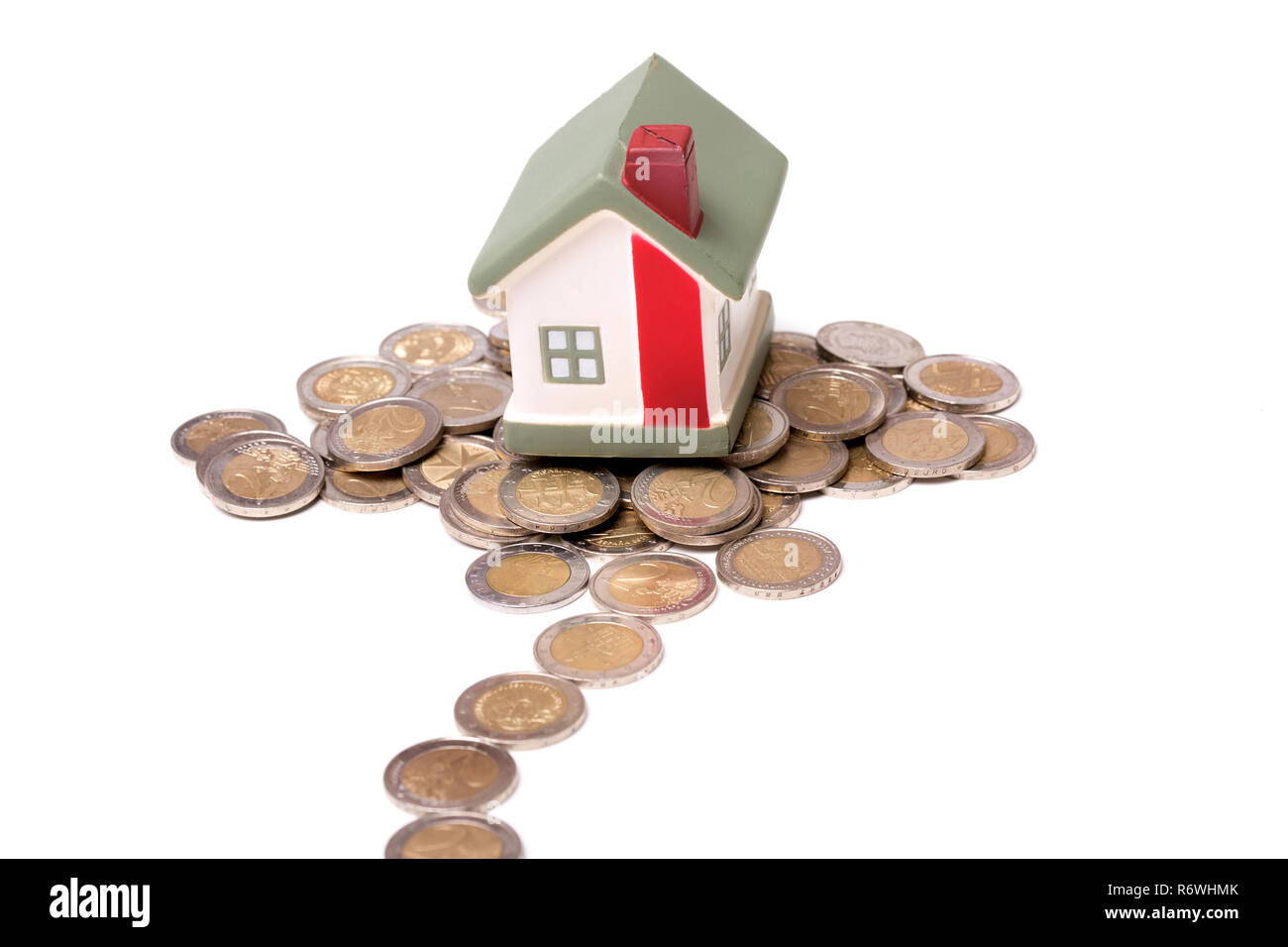 small house and coins Stock Photo - Alamy