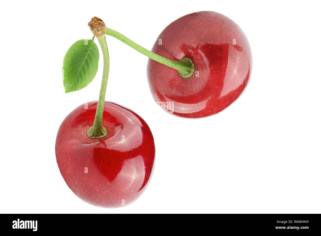 Close up view of two cherries Cut Out Stock Images & Pictures - Alamy