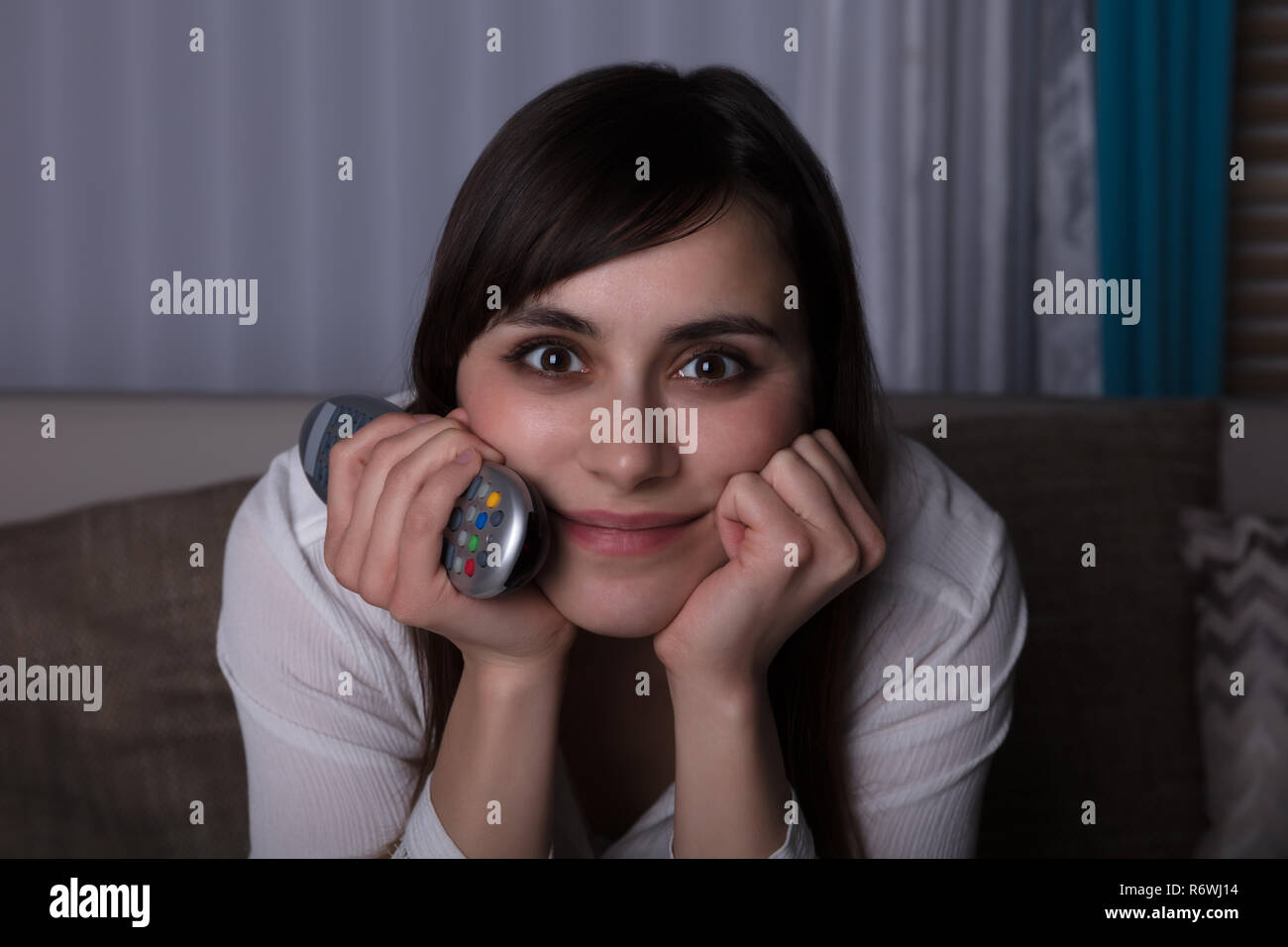 Caucasian delighted woman watch interesting hi-res stock photography ...