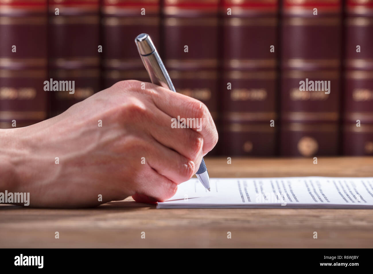Human hand signing authority document hi-res stock photography and ...