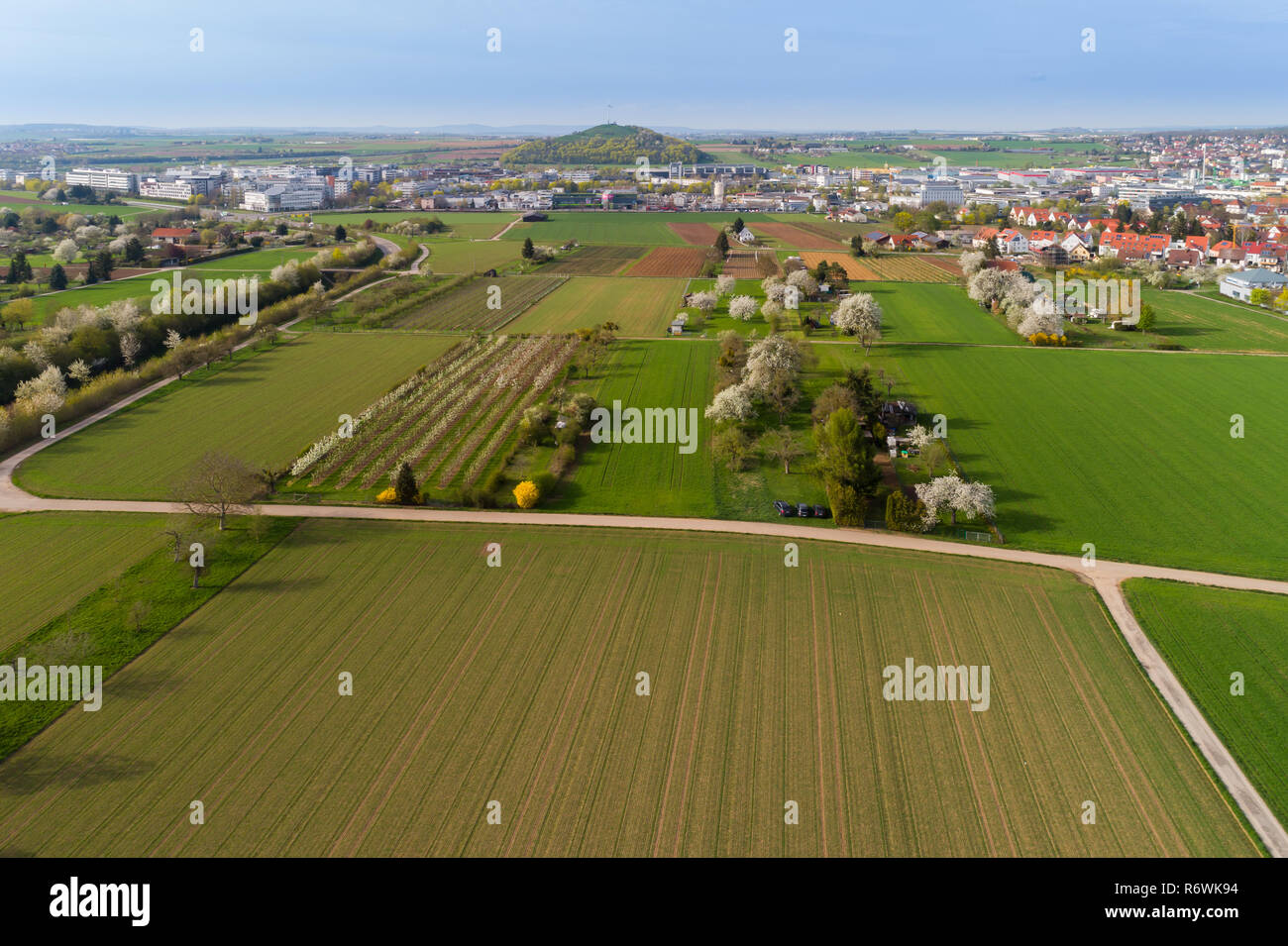 aerial view overlooking a rubble mountain with a wind turbine Stock ...