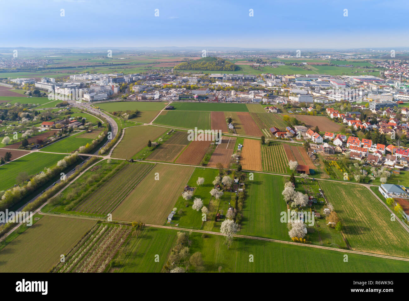 aerial view overlooking a rubble mountain with a wind turbine Stock ...