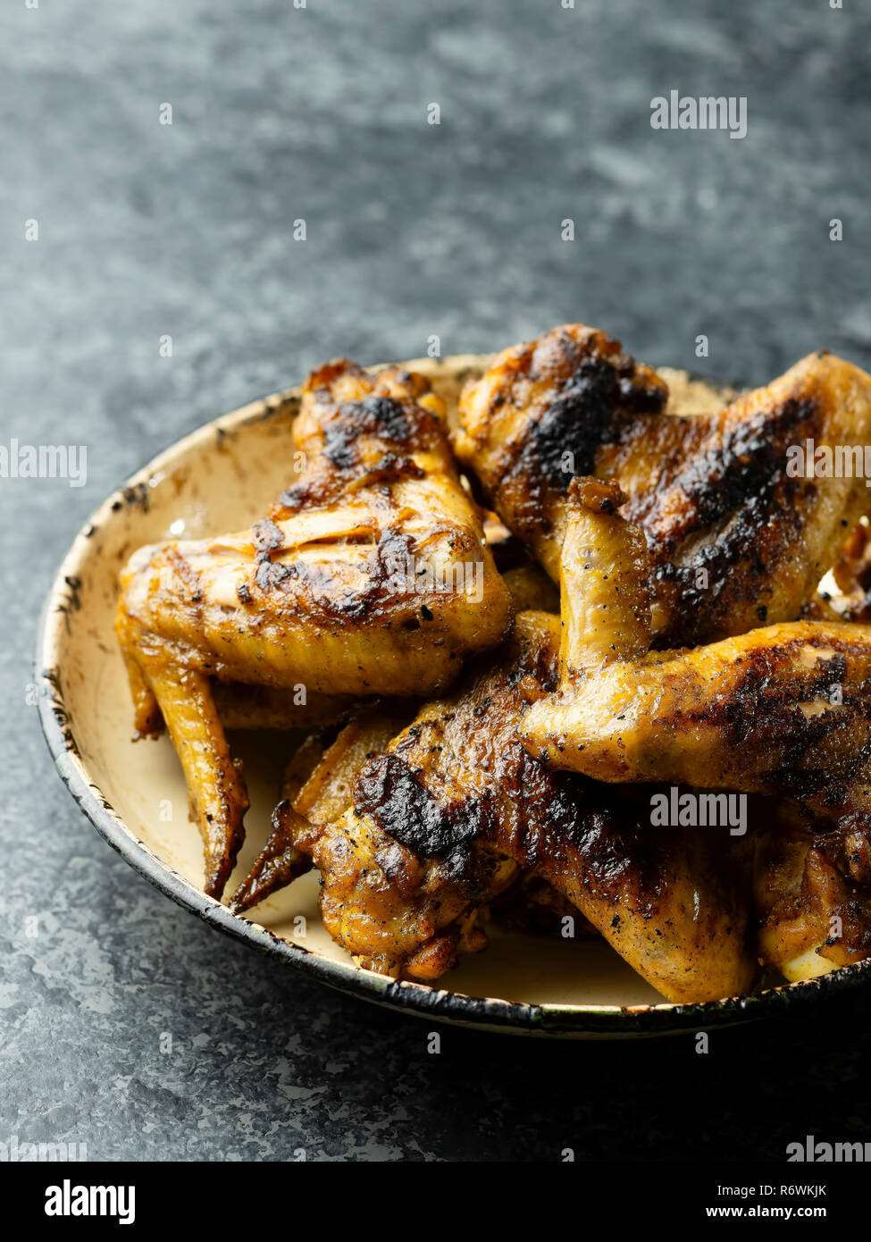 plate of barbecue chicken wing Stock Photo - Alamy